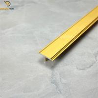 China Anodized Matt Gold Aluminum T Shaped Transition Strip 2.5m Flooring Trim for sale