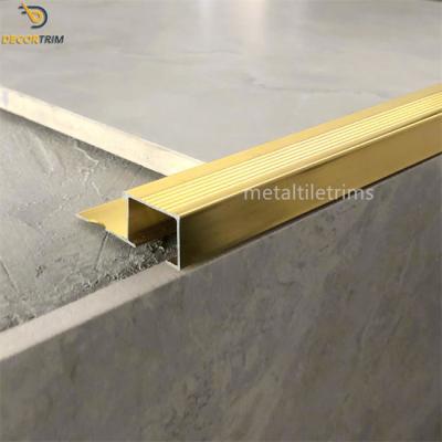 China 13mm Box Shape Shiny Gold Aluminum Stair Nosing Tile Trim 6063 T5 2.5m for sale