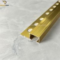 China 13mm Box Shape Shiny Gold Aluminum Stair Nosing Tile Trim 6063 T5 2.5m for sale