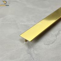 China Polish Gold 25mm Aluminum Tile Edge Trim T Molding Floor and Wall Divider Strip for sale