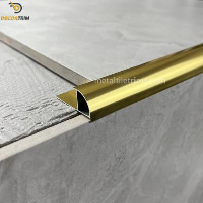 China Gold Aluminum 6063 Tile Trim Round Shape Metal Edging Decoration 2.4m Length 0.9mm Thickness for sale