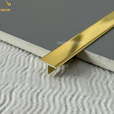 China Aluminum T Shaped Tile Trim Transition Strip 7.4mm Polished Gold for Ceramic Flooring for sale