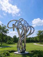 China Modern Abstract Sculpture Stainless Steel Mirror Polished Surface Outdoor Garden Lawn Decoration Artistic Fluid Curves for sale