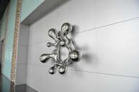 China Indoor Mirror Stainless Steel Sculpture Abstract Spray Water Metal Art Decoration for sale