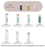 China IKOO 600ml Borosilicate Glass Water Bottle with Bamboo Lid and Protective Silicone Sleeve for sale