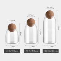 China High Borosilicate Glass Storage Jar with Cork Lid in 550ml 750ml 1200ml Sizes for Eco-Friendly Food Storage for sale