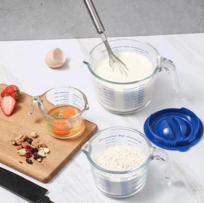 China Heat Resistant Glass Measuring Cup 500ml 1000ml with PP Lid for sale