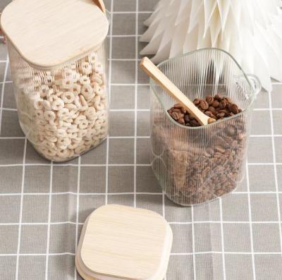 China IKOO Ribbed Design High Borosilicate Glass Jar with Bamboo Lid for Kitchen Storage and Meal Prep for sale
