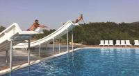 China Customized Water Theme Park Equipment High Speed Water Slide And Bouncer for sale