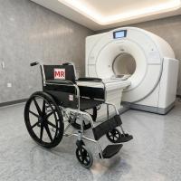 China MR Dedicated 24-inch Folding Wheelchair with Aluminum Alloy Large Wheels and Footrests for MRI Department Use Only for sale