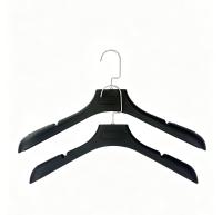 China Matte black non-slip ABS material suit hanger for coats and suits with chrome flat hooks for sale