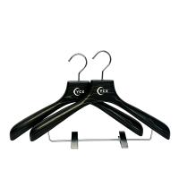 China ABS material suit hanger with wide shoulders and non-slip grip for clothing stores and hotels for sale