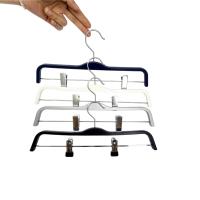 China Hand-painted flat plastic trouser hanger with customizable hooks and clips and logo printing for clothing stores for sale