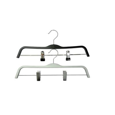 China Hand-painted flat plastic trouser hanger with customizable hooks and clips and logo printing for clothing stores for sale