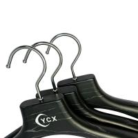 China ABS material suit hanger with wide shoulders and non-slip grip for clothing stores and hotels for sale
