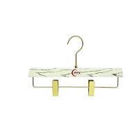 China Gold-plated non-slip plastic trouser clips with customizable color and logo for hotels and clothing stores for sale