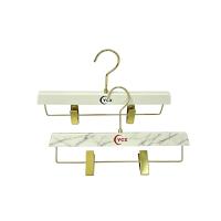 China Gold-plated non-slip plastic trouser clips with customizable color and logo for hotels and clothing stores for sale