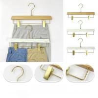 China Gold-plated non-slip plastic trouser clips with customizable color and logo for hotels and clothing stores for sale