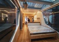 China Luxury Prefab Capsule With Light Steel Space Frame Tiny Building Portable House On Wheels for sale