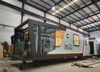 China Luxury Prefab Capsule With Light Steel Space Frame Tiny Building Portable House On Wheels for sale