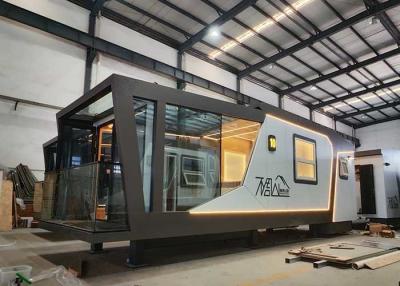 China Luxury Prefab Capsule With Light Steel Space Frame Tiny Building Portable House On Wheels for sale