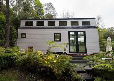 China Light Steel Prefab Tiny House With Metal PU Sandwich Panel Wall And Trailer for sale