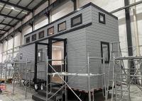 China Light Steel Prefab Tiny House With Metal PU Sandwich Panel Wall And Trailer for sale