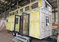 China Metal Roof Prefabricated tiny House on wheels With Air Conditioning And Furniture Options for sale