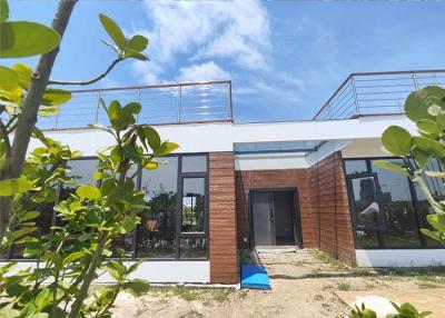 China Modern Prefab Homes With Light Gauge Steel Framing Systems Wooden Bungalow For Beach for sale