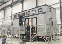 China Modern Prefab Modular Home Luxury Caravan Tiny House On Wheels Shipped By 40 FR Shipping Container for sale