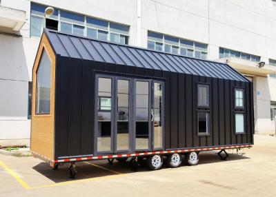 China Australia Standard Light Steel Structure Tiny House With Trailer On Wheels For Camping for sale