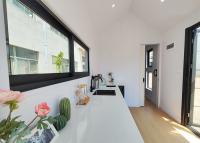 China Light Steel Frame Prefab Trailer Tiny House On Wheels, Sustainable Living Modular Home for sale