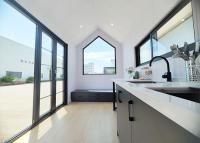 China Light Steel Frame Prefab Trailer Tiny House On Wheels, Sustainable Living Modular Home for sale