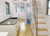 China Prefabricated Light Steel Frame Tiny House On Wheels Long Life Span Tiny Prefab Homes for sale