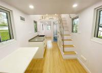 China Prefabricated Light Steel Frame Tiny House On Wheels Long Life Span Tiny Prefab Homes for sale