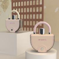 China 100ml Glass Perfume Bottles Handbag Shaped Leather Rope Handle Spray Empty for sale
