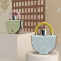 China 100ml Glass Perfume Bottles Handbag Shaped Leather Rope Handle Spray Empty for sale