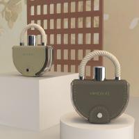 China 100ml Glass Perfume Bottles Handbag Shaped Leather Rope Handle Spray Empty for sale