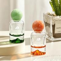 China 50ml Glass Perfume Bottle Empty Round Cap Cylinder Spray Crimp Neck for sale