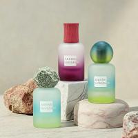 China 50ml Glass Perfume Bottles Frosted Cylinder Spray Round Wooden Stone Cap Empty for sale