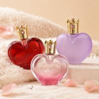 China 100ml Glass Perfume Bottles Heart Shaped Crown Cap Empty Spray for sale