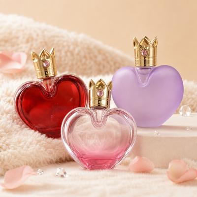 China 100ml Glass Perfume Bottles Heart Shaped Crown Cap Empty Spray for sale
