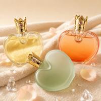 China 100ml Glass Perfume Bottles Heart Shaped Crown Cap Empty Spray for sale