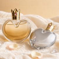 China 100ml Glass Perfume Bottles Heart Shaped Crown Cap Empty Spray for sale