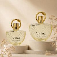 China 50ml 100ml Glass Perfume Bottle Unique Ring Cap Handbag Style Empty Spray for sale