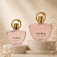 China 50ml 100ml Glass Perfume Bottle Unique Ring Cap Handbag Style Empty Spray for sale