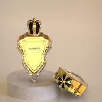 China 100ml Glass Perfume Bottles Unique Crown Cap Shield Shape Spray Crimp Neck Empty for sale