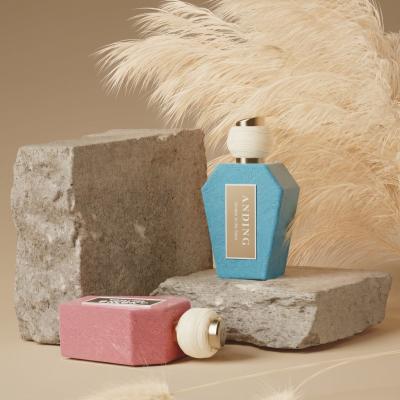 China 100ml Glass Perfume Bottles Empty Unique Round Cap Crimp Neck Spray Hexagon for sale