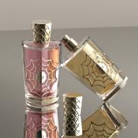 China 100ml Glass Perfume Bottles Empty Unique Spray Triangle Spider Web Metal Cap for sale