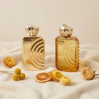 China 100ml Glass Perfume Bottles Unique Disc Cap Spray Rectangle Empty Wavy Crimp Neck for sale